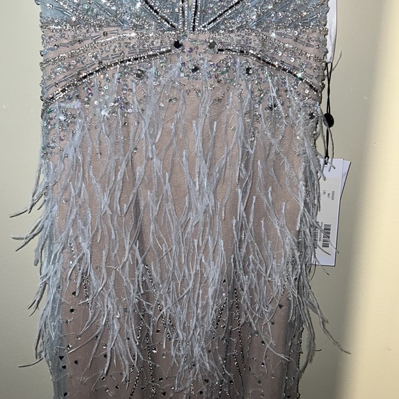 Jovani | Dresses | Jovani 3023 Sheer Bodice Beaded Adorned Feather ...